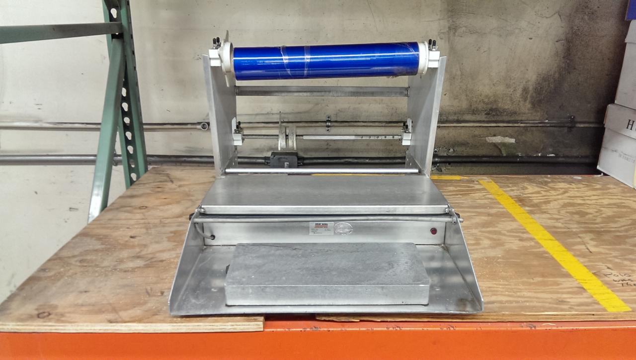 Lot #22: HeatSeal 825A Table Top Wrapper - WireBids